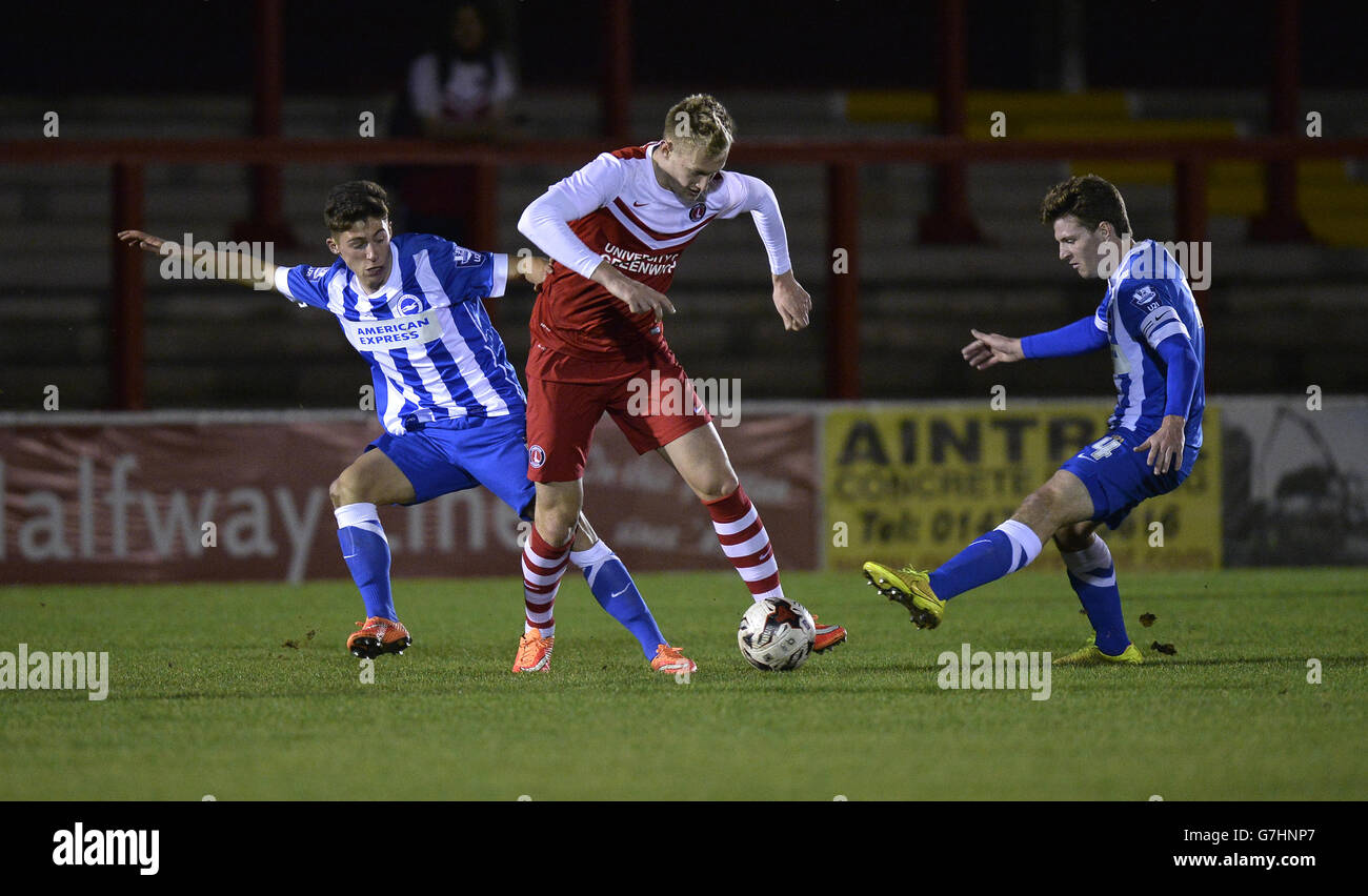 Charlton Athletic's Joe Piggott battles through the Brighton & Hove ...