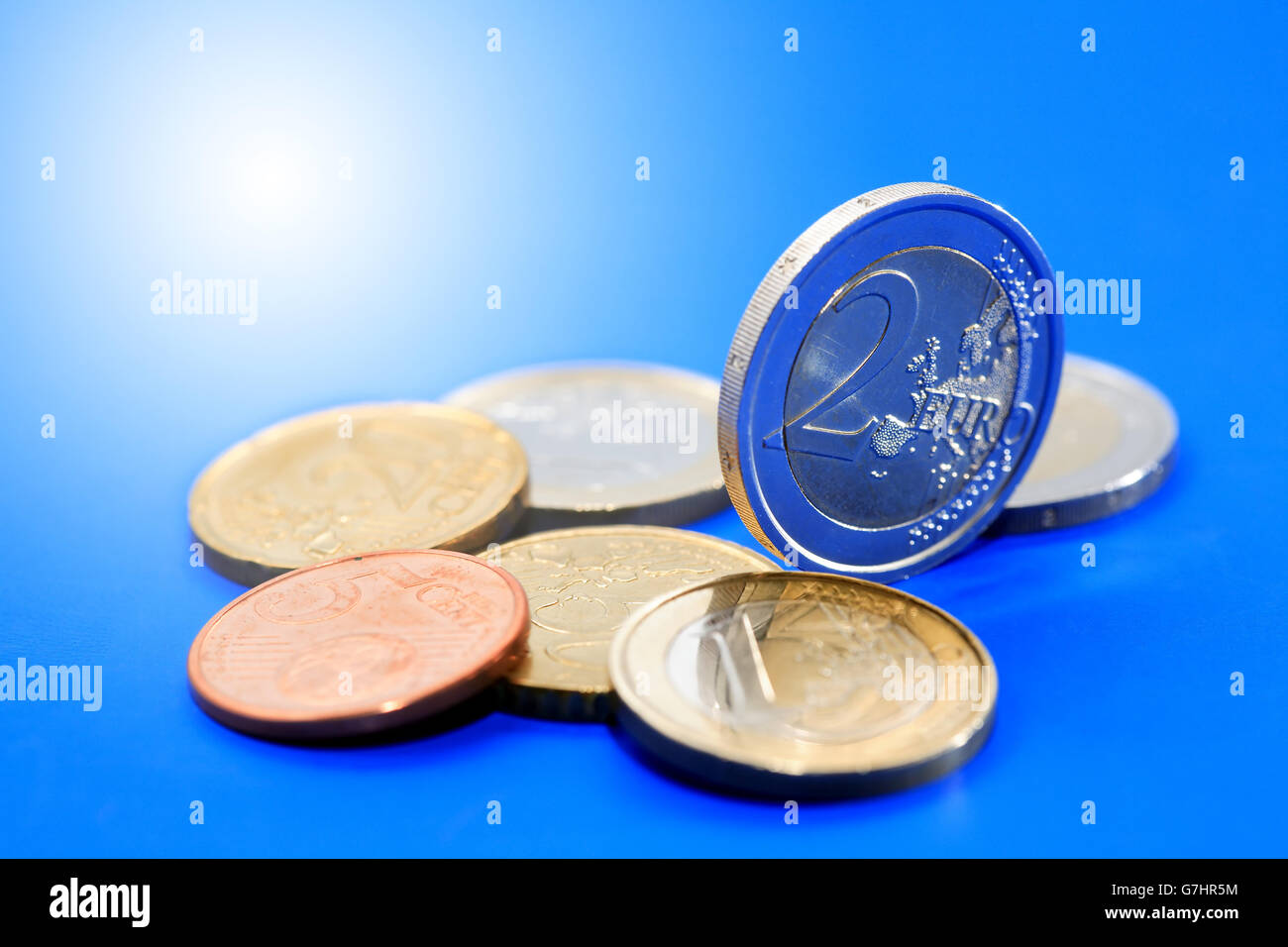 Set of European coins on nice blue background Stock Photo - Alamy