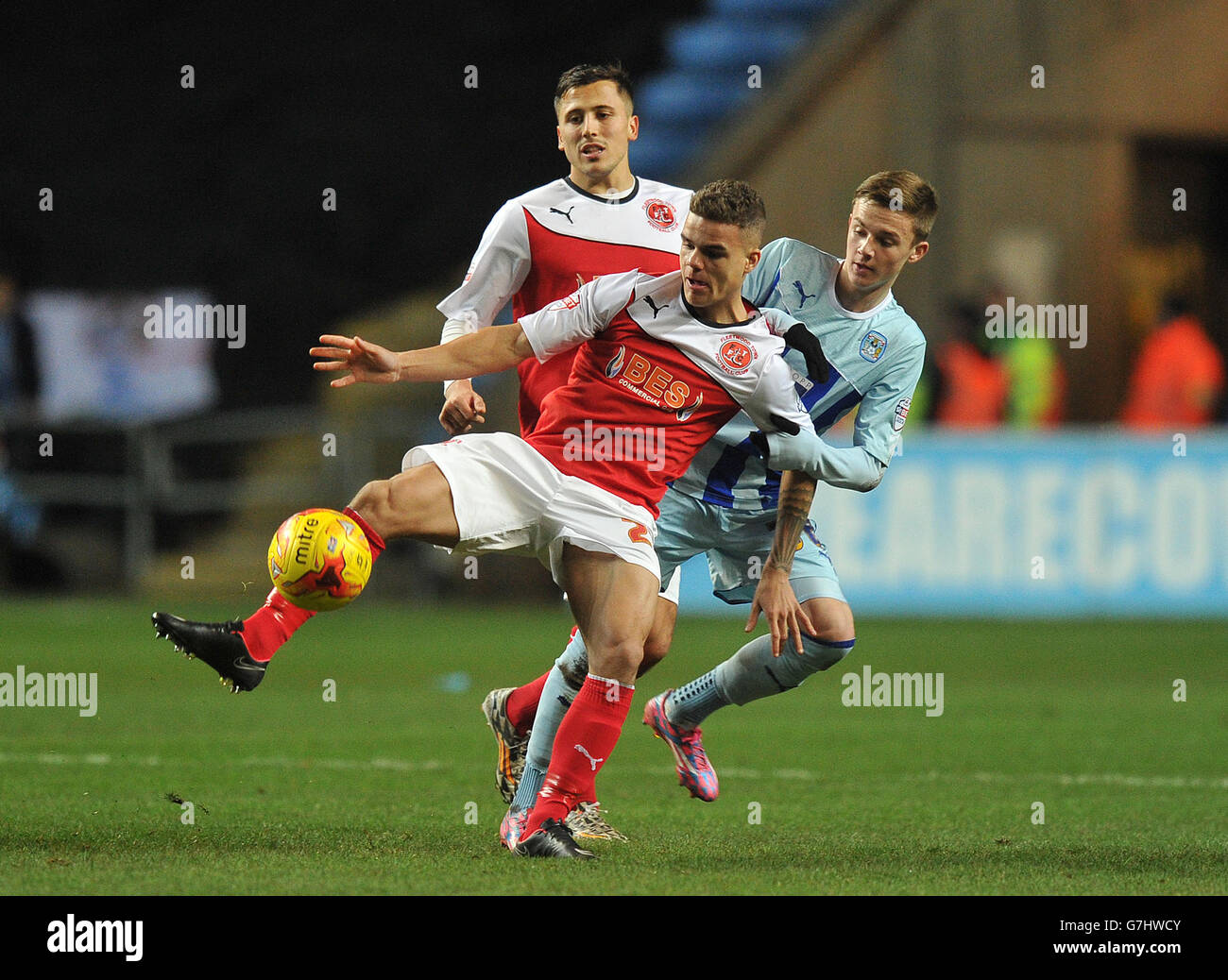Fleetwood Town's Tyler Forbes and Coventry City's James Maddison battle ...