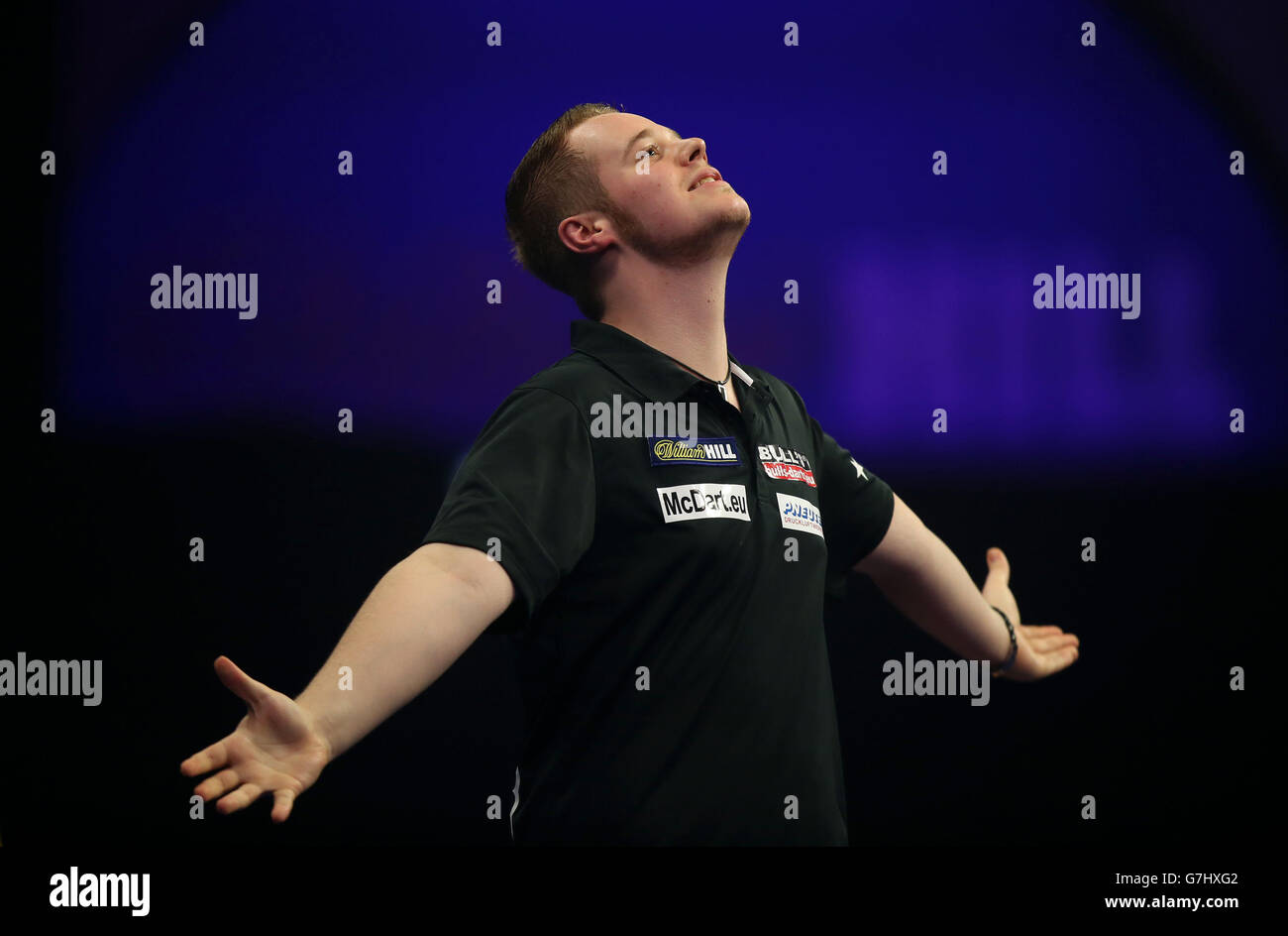 Max Hopp celebrates defeating Mervyn King during the William Hill World ...