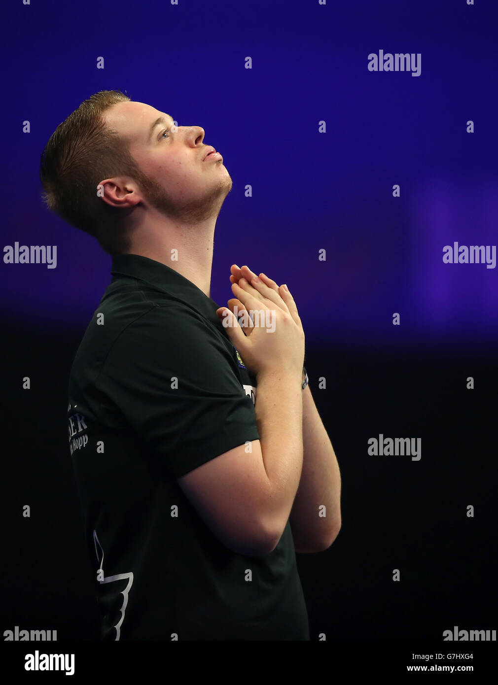 Max Hopp celebrates defeating Mervyn King during the William Hill World ...