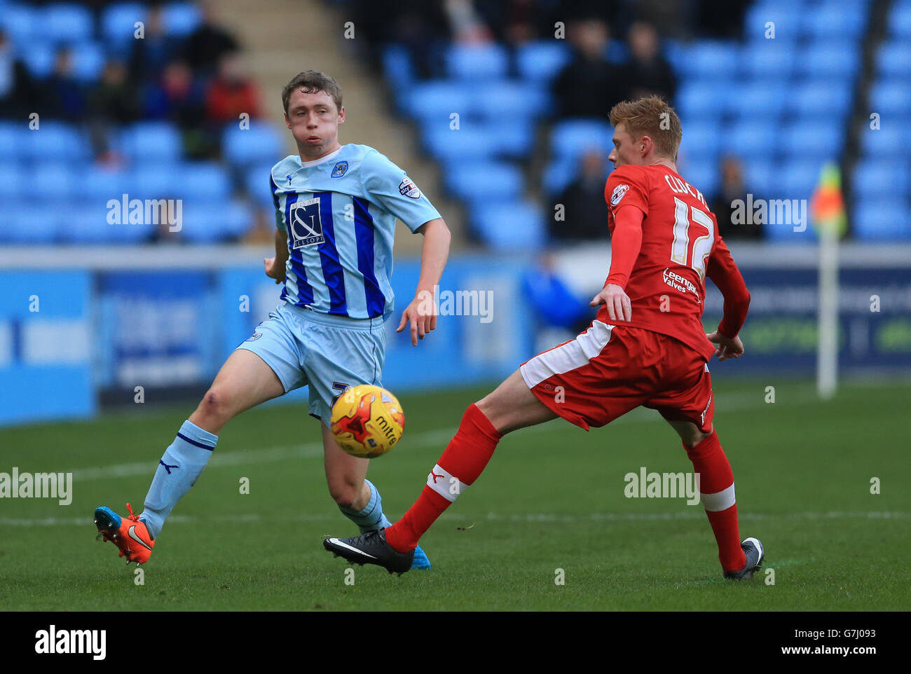 Coventry City's Matthew Pennington (left) and Chesterfield's Sam Clucas ...