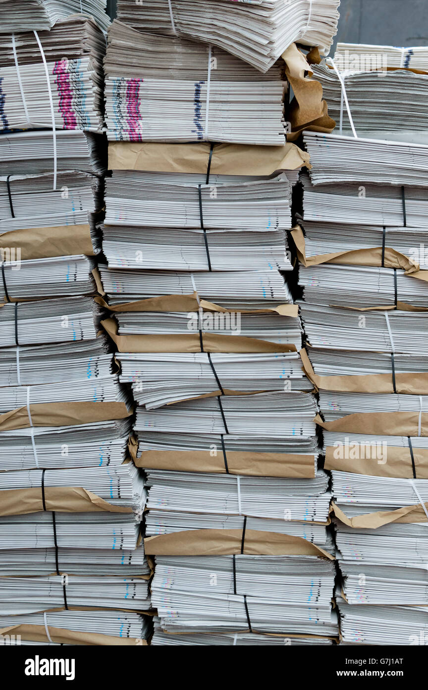 Stack of newspapers stored vertically Stock Photo - Alamy