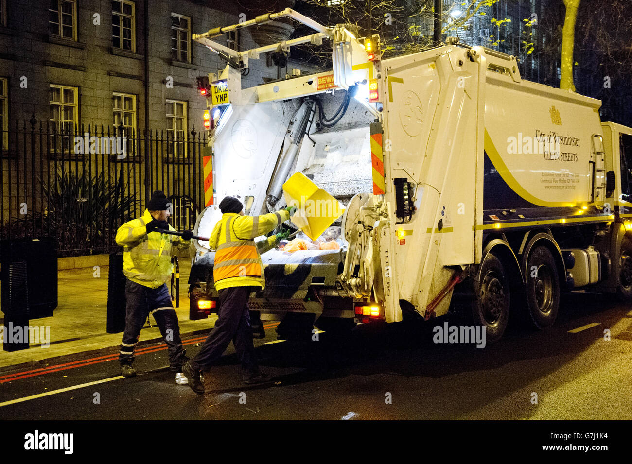 Workers clean up after the fireworks display in central London after ...