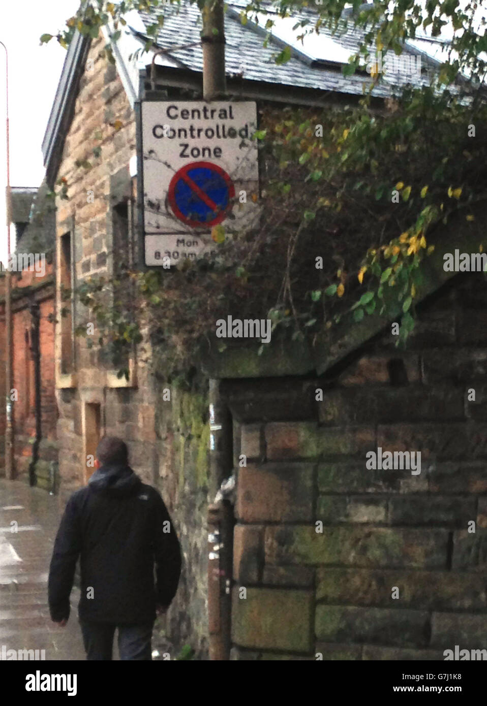An obscured CPZ entry sign on Abbeyhill in Edinburgh as Parking ...