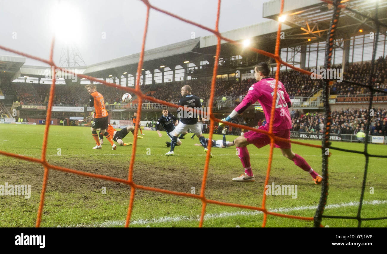 Dundee United's Chris Erskine scores his first goal past goalkeeper ...