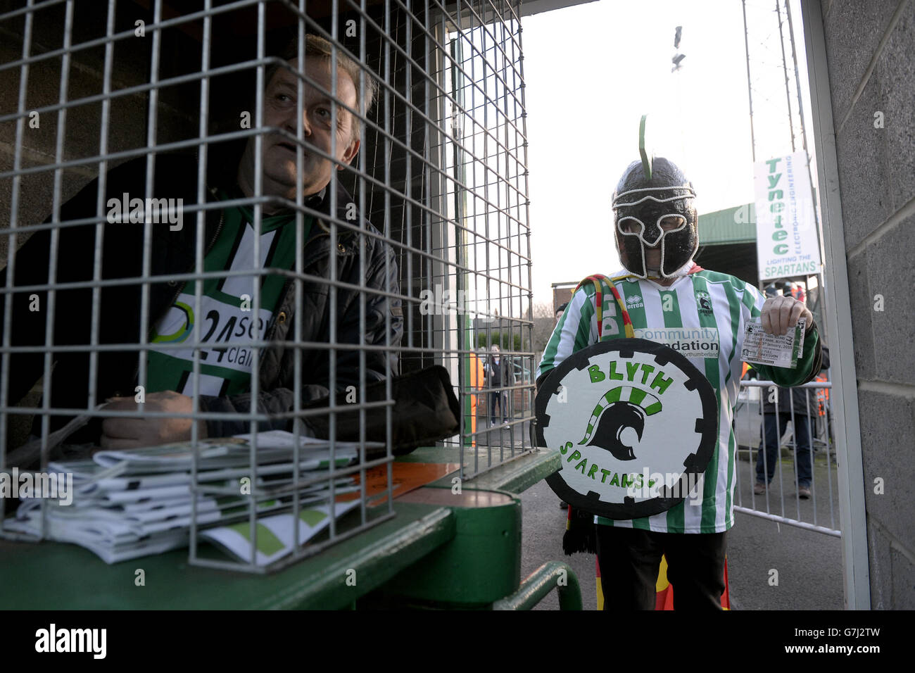 Blyth Spartans fans dressed up as Spartans enter through the turnstiles ...