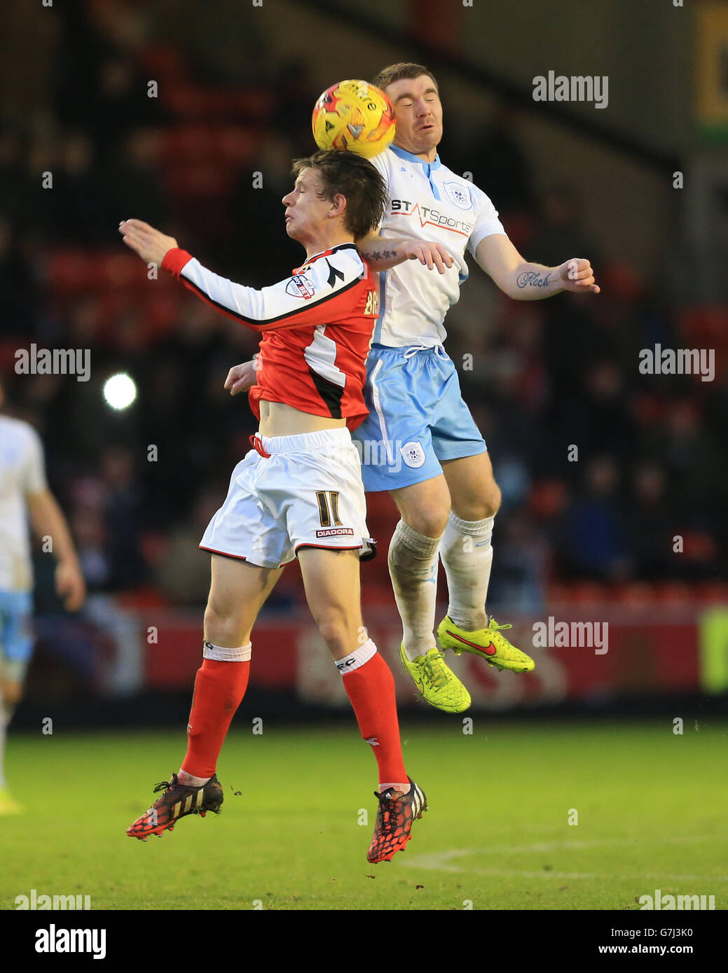 Walsall's James Baxendale (left) and Coventry City's John Fleck battles ...