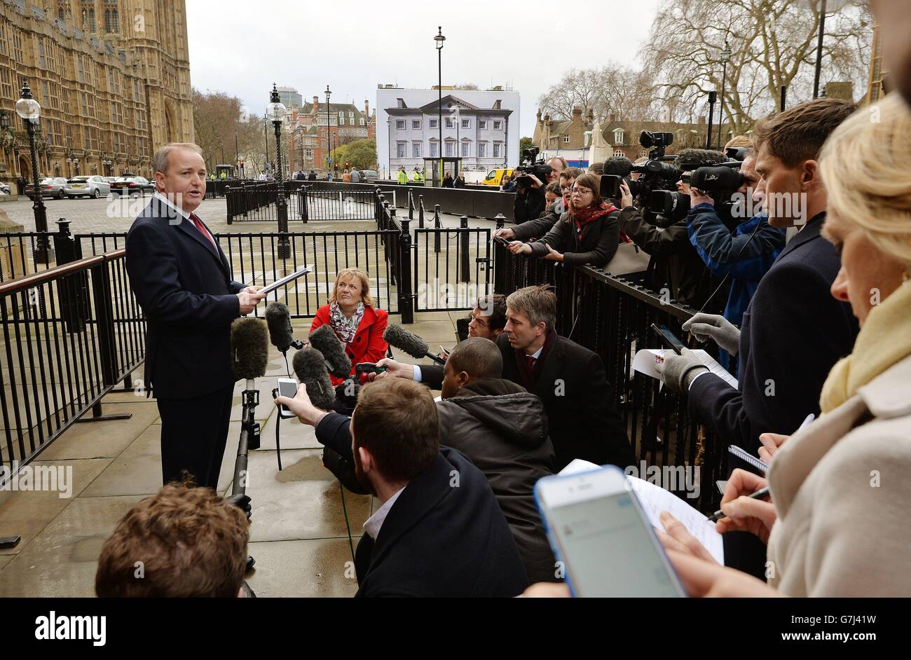 Conservative MP Mark Pritchard reads a statement outside St Stephen's ...