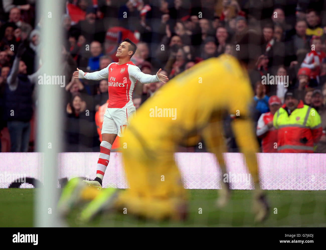 Arsenal's Alexis Sanchez celebrates scoring his second goal of the game ...