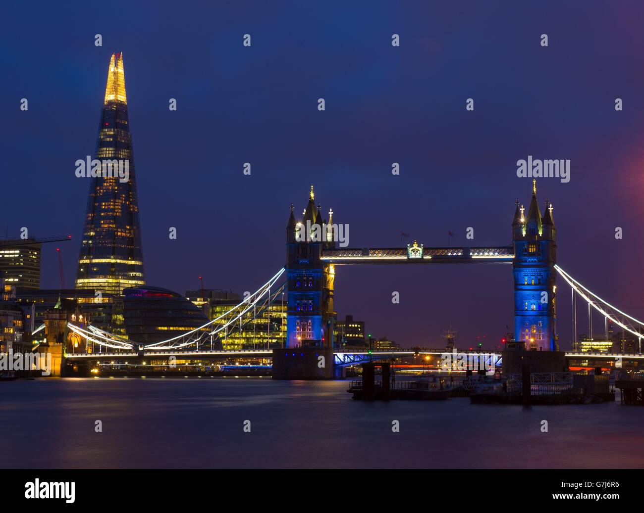 Tower Bridge, in central London, is illuminated with the colours of the ...