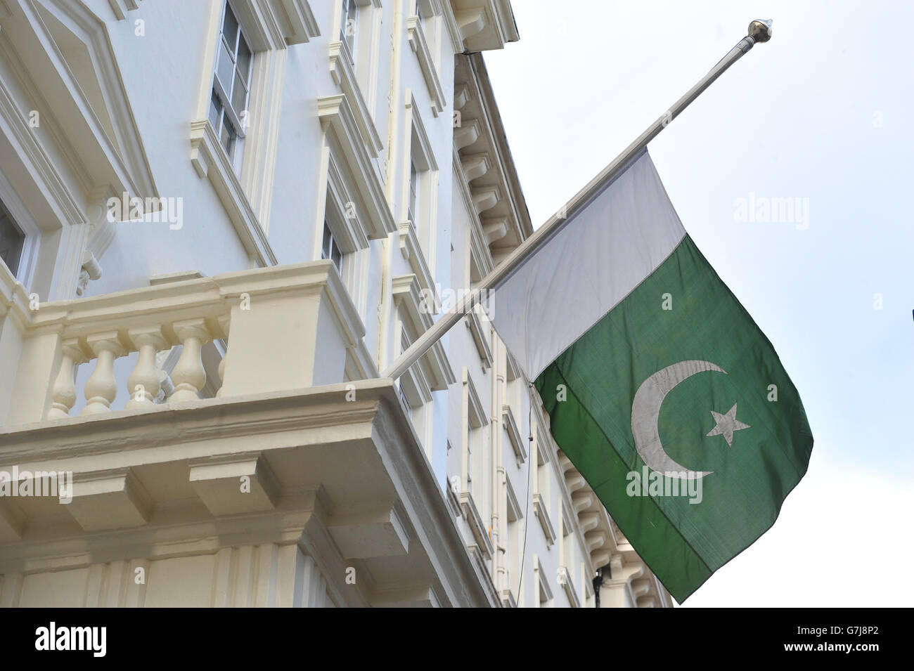 The flag of Pakistan flies at half mast outside the Pakistan High ...
