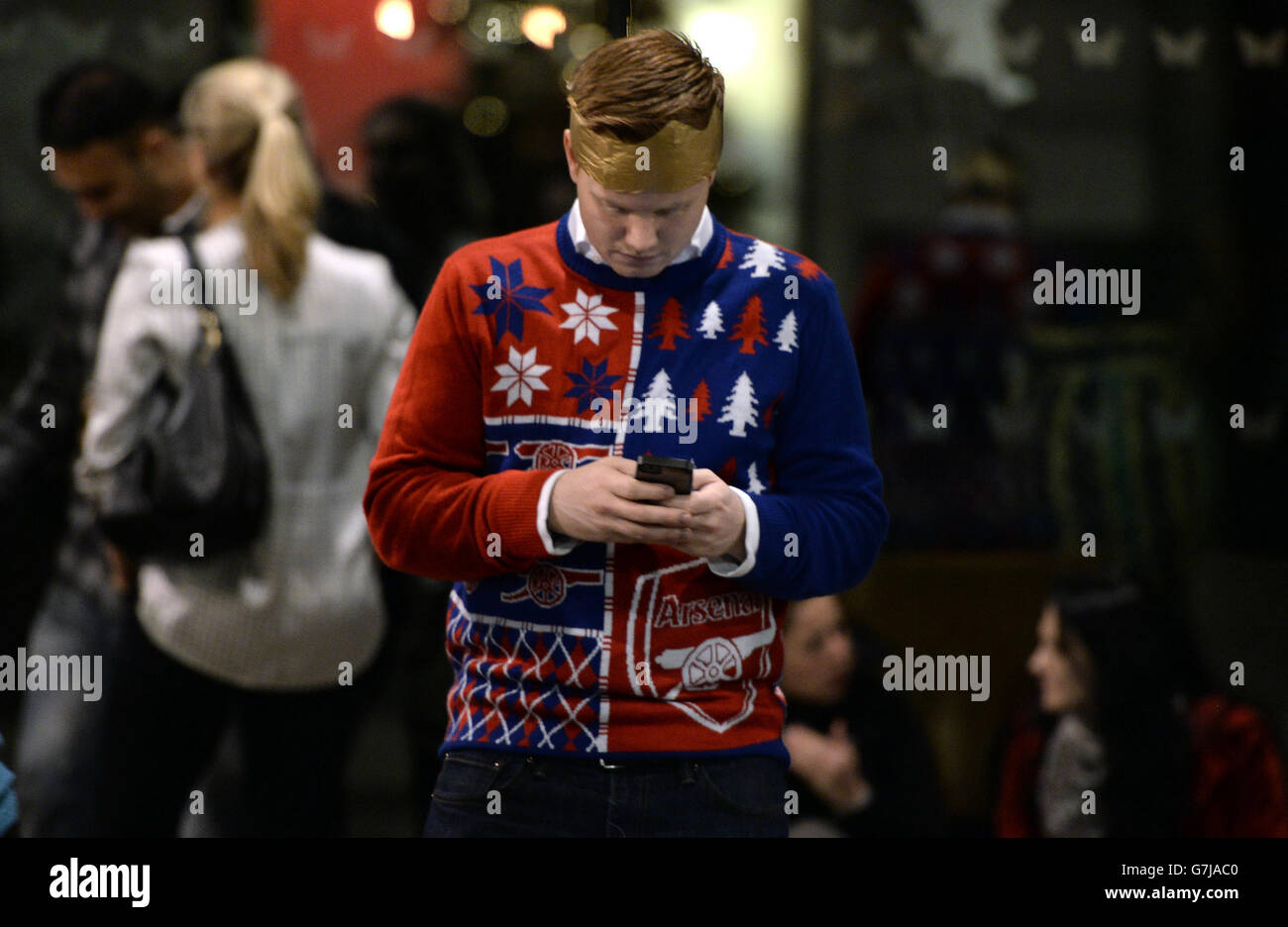 A man wears a Christmas jumper in London on the last Friday before ...