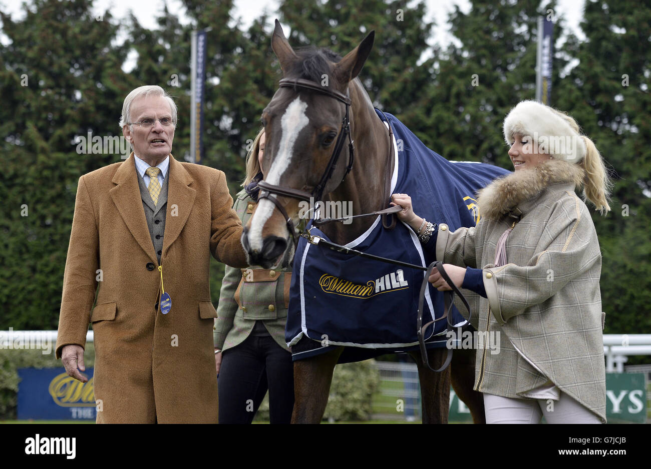 Kauto Star is paraded in front of his statue by Owner Clive Smith (left ...