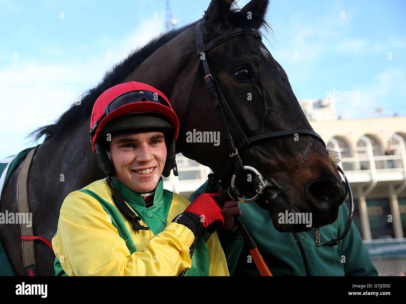 Jockey Johnny Burke with Sizing John in the parade ring after winning ...