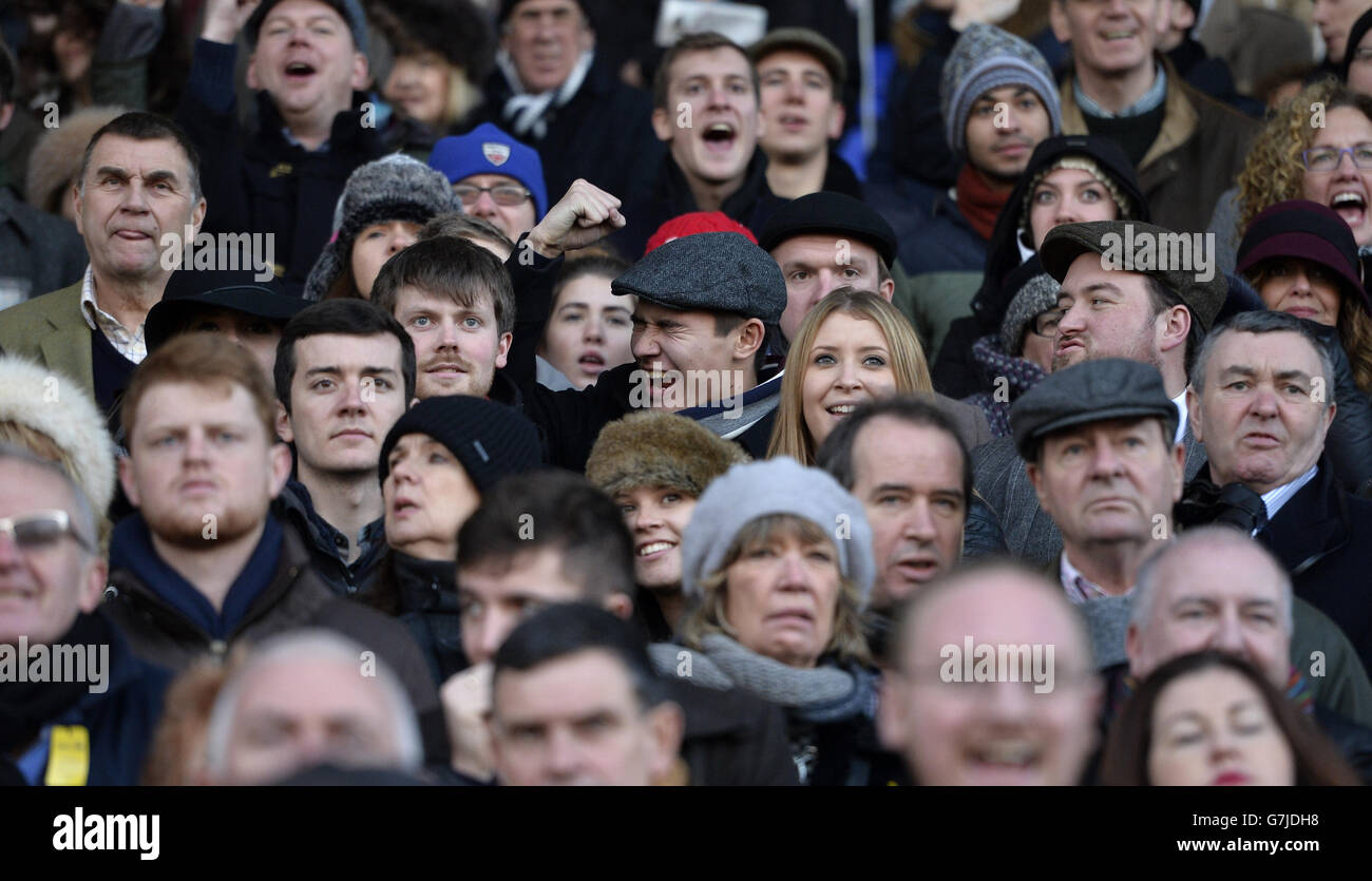 Racegoers cheer on their horse from the stands hi-res stock photography ...