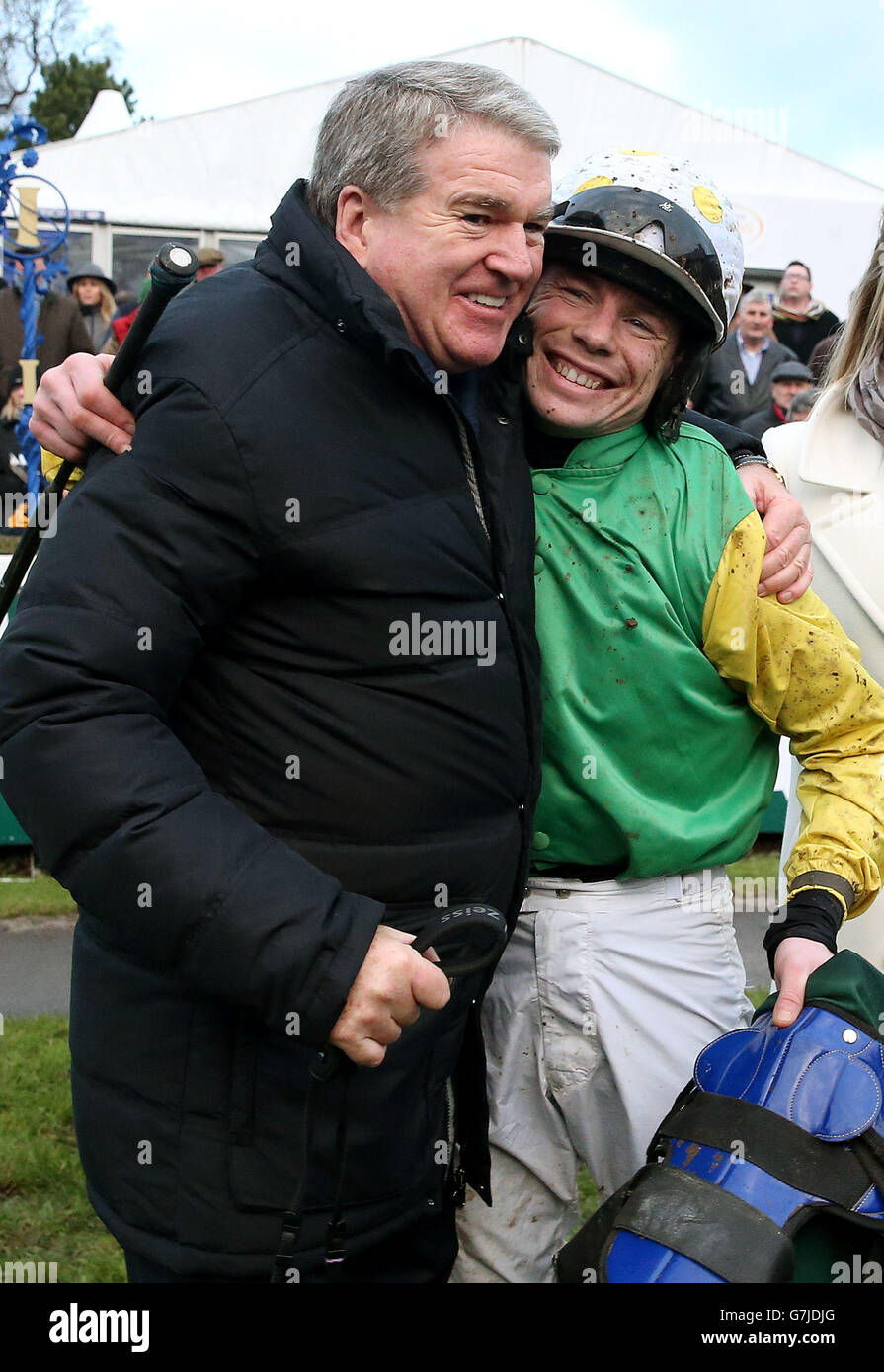 Jockey Denis O'Regan celebrates with owner John Breslin in the parade ...