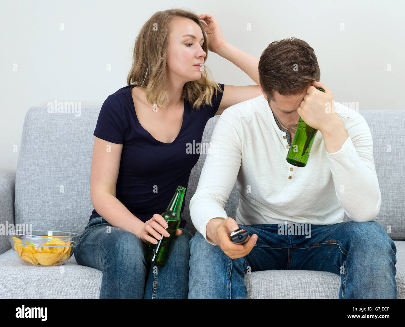 Woman sad watching man home hi-res stock photography and images - Alamy