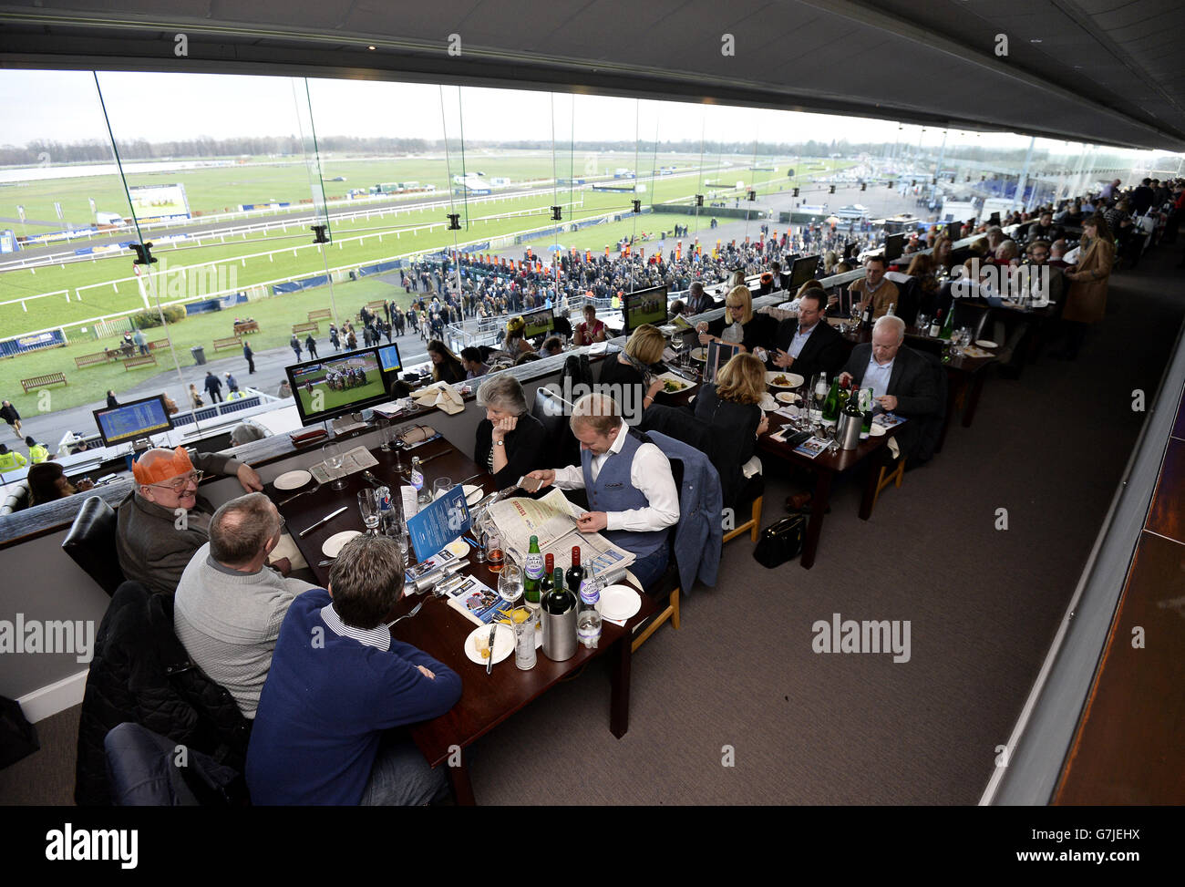 Racegoers enjoy the racing from the Panoramic Restaurant at Kempton ...