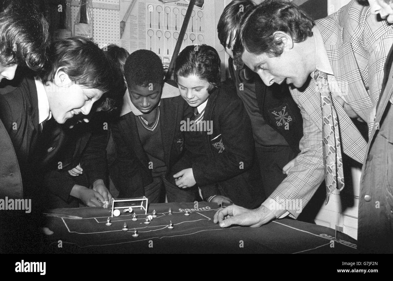 Young boys playing popular table top football game Subbuteo Stock Photo ...