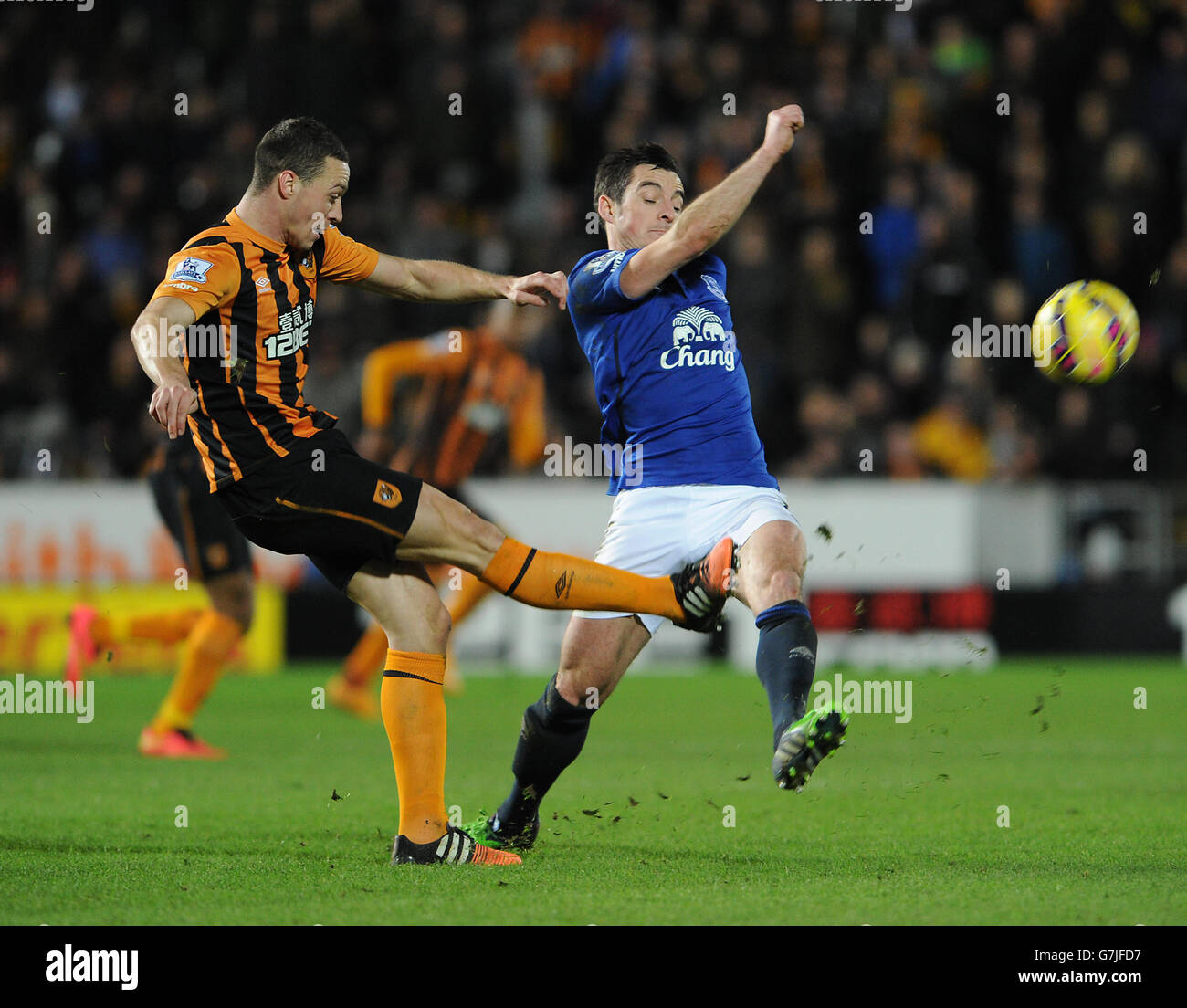 Hull City's James Chester and Everton's Leighton Baines (right) battle ...