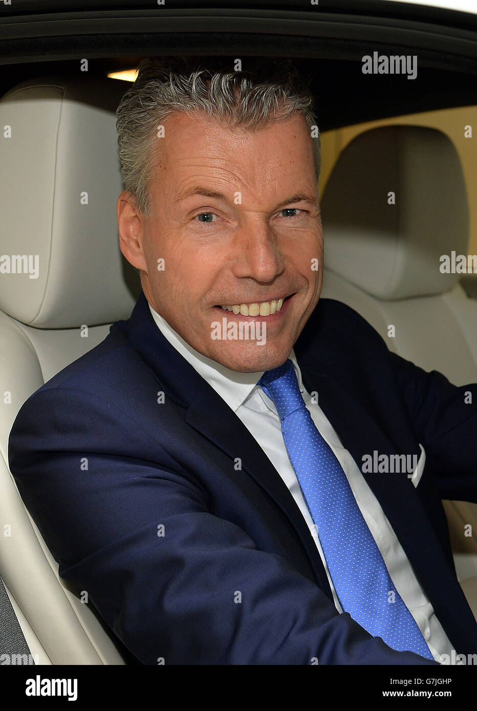 Chief Executive of Rolls-Royce Motor Cars Torsten Muller Otvos sits in a Rolls Royce car in the ...