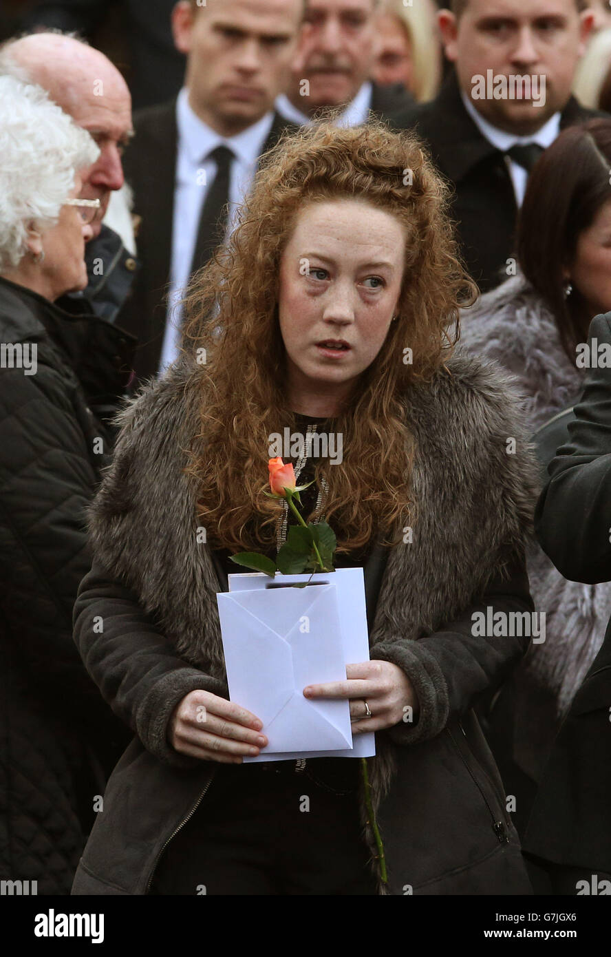 Pamela watches as the coffin of her sister, Stephenie Tait leaves Saint ...
