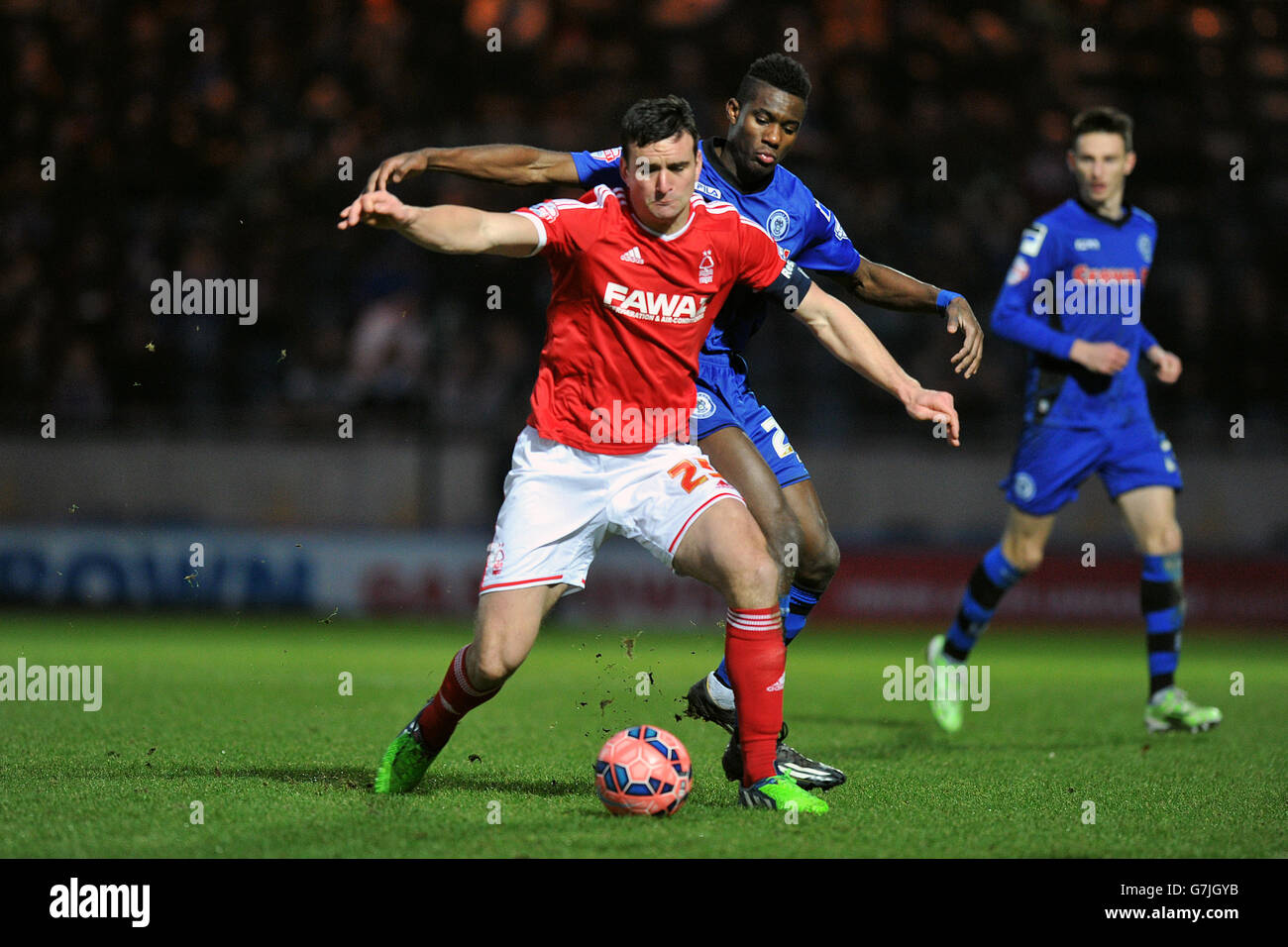 Nottingham Forest's Jack Hobbs (left) battles with Rochdale's Joel ...