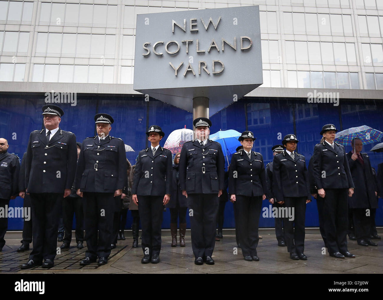 Metropolitan Police officers and staff during a two minute silence ...