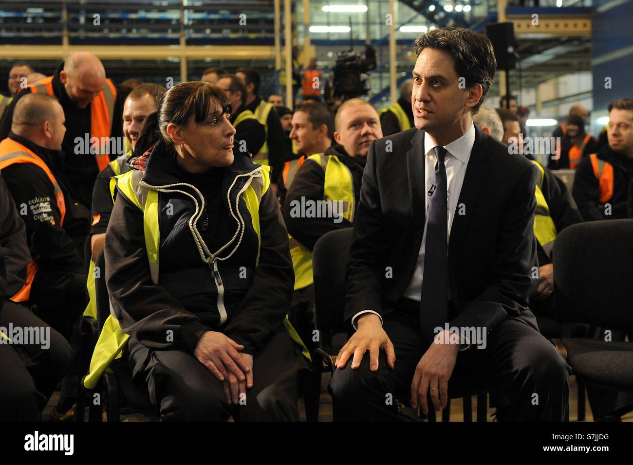 Labour leader Ed Miliband talks to warehouse worker Dawn Privett during ...