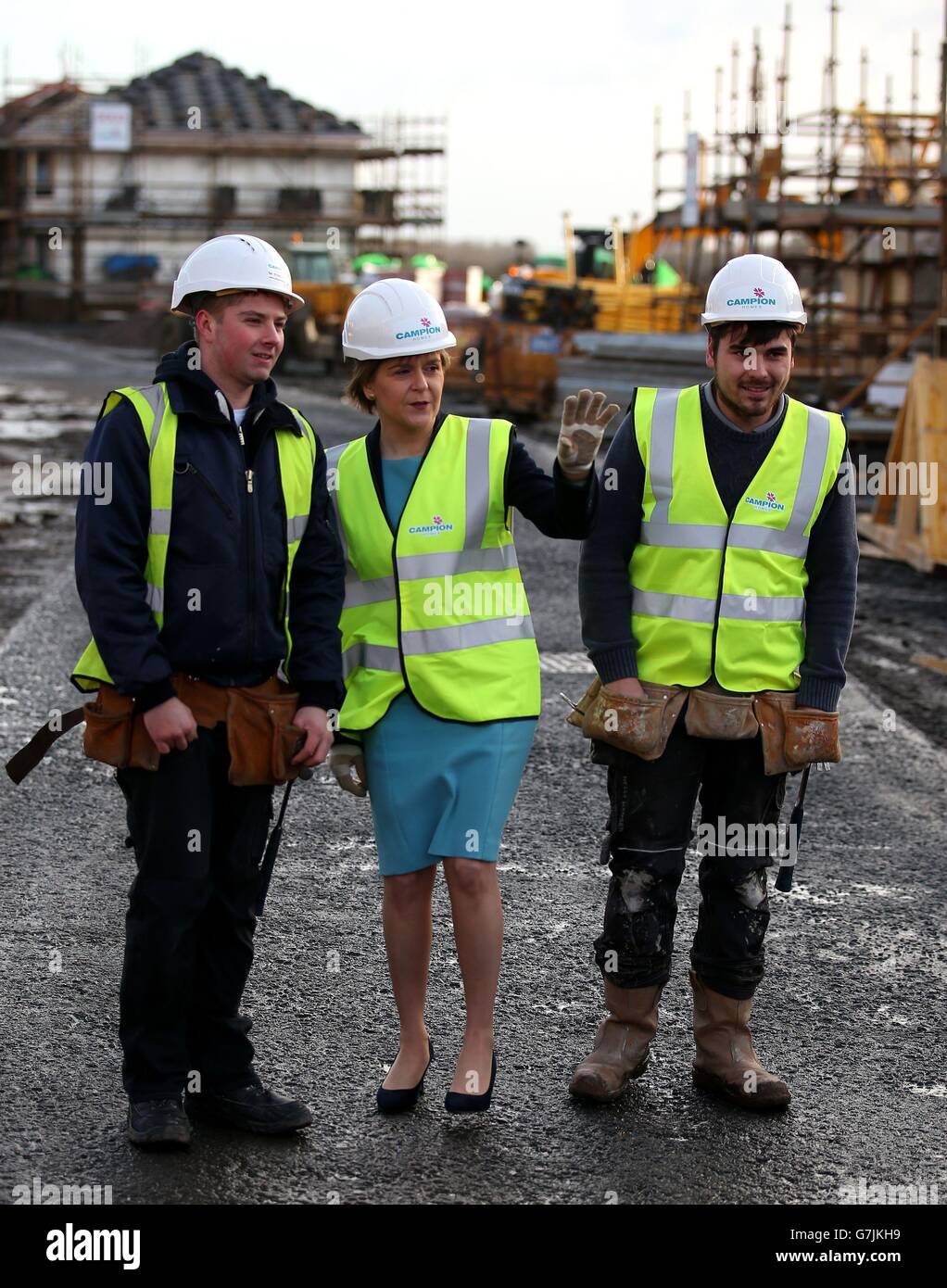 Scotland's First Minister Nicola Sturgeon with apprentices Dean Muir ...