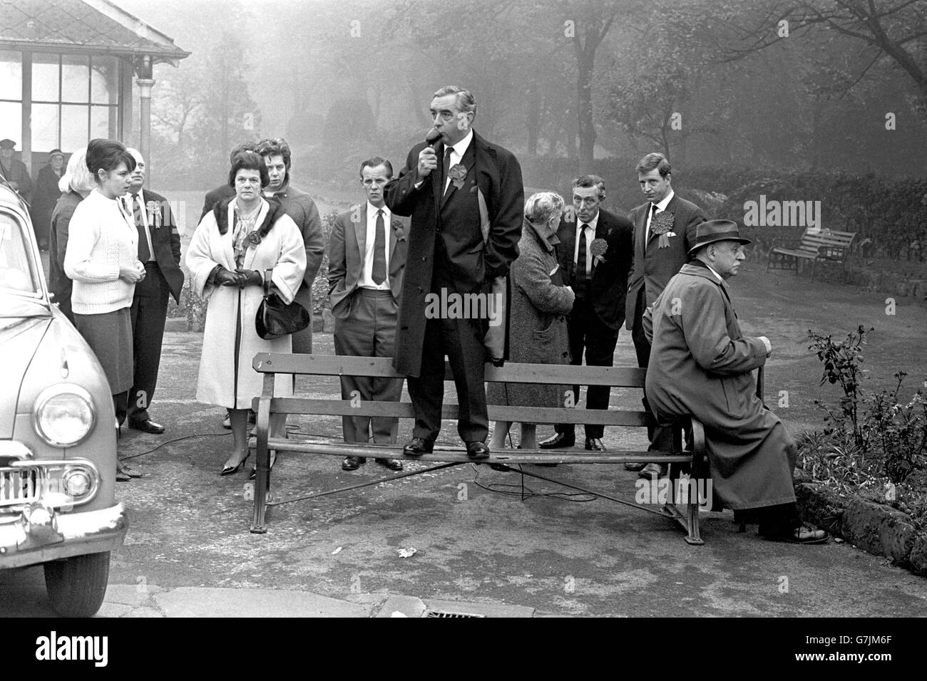 Deputy Labour leader George Brown stands on a park bench to address an ...