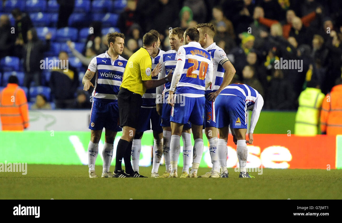 The Reading players talk to Referee James Linington after Norwich City ...