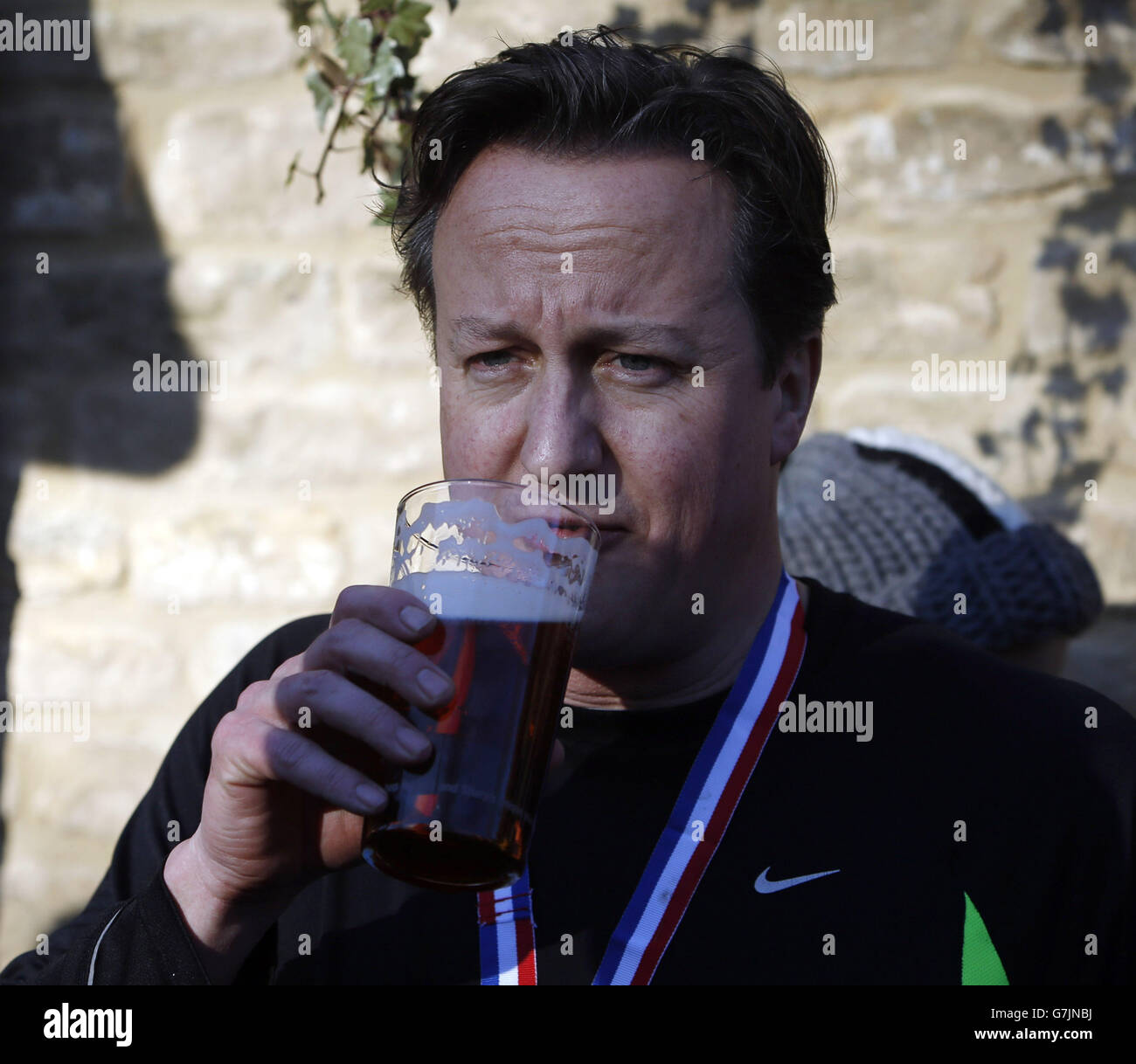 Prime Minister David Cameron drinks a pint having taken part in the ...