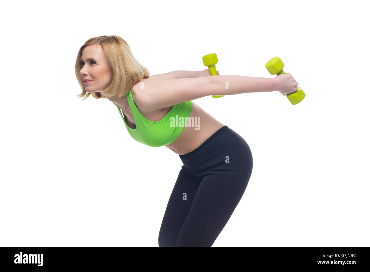 Beautiful woman doing sport exercise with dumbbells Stock Photo - Alamy