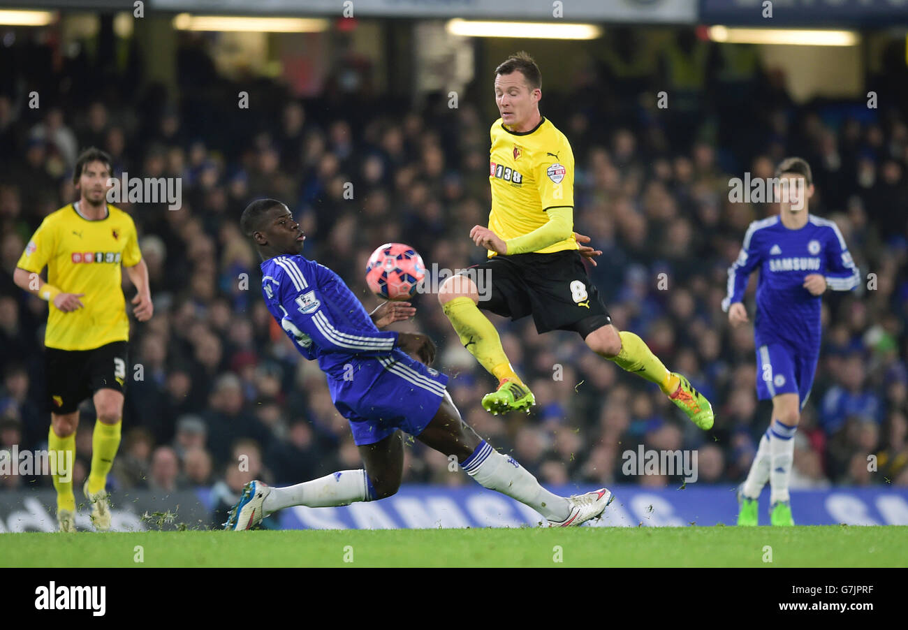 Watford's Daniel Tozser attempts to jump the tackle from Chelsea's Kurt ...