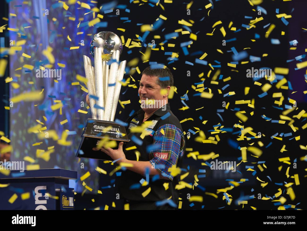 Gary Anderson celebrates with the Sid Waddell trophy after defeating ...