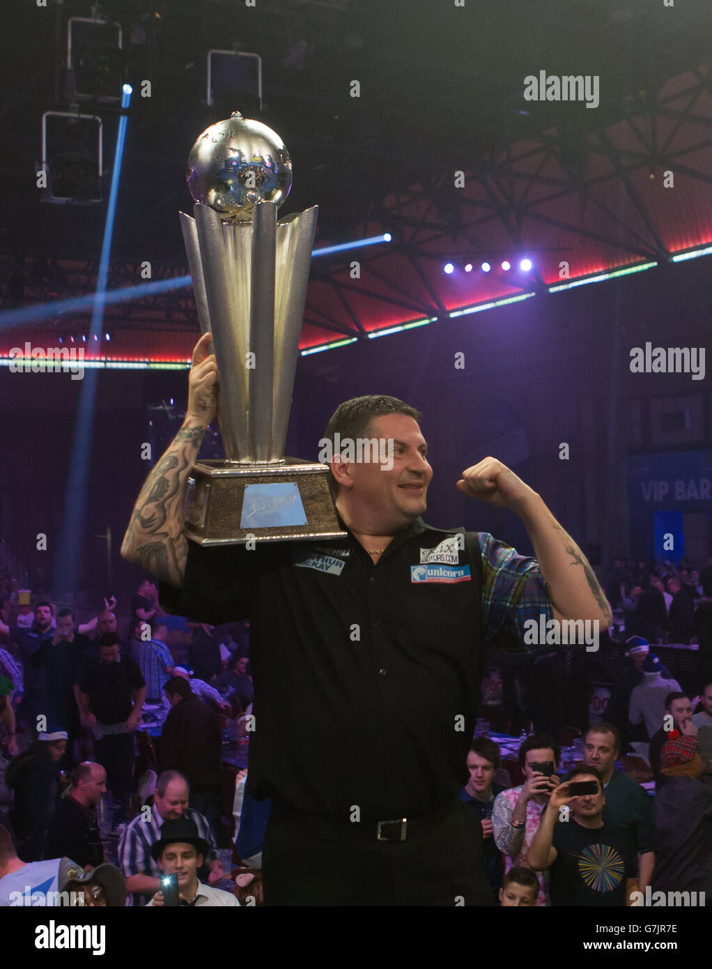 Gary Anderson celebrates with the Sid Waddell trophy after defeating ...