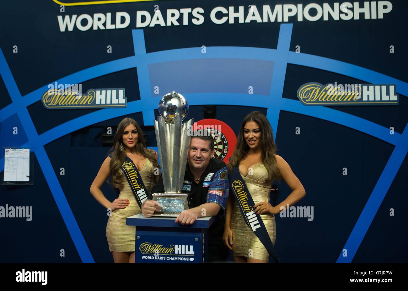 Gary Anderson celebrates with the Sid Waddell trophy after defeating ...
