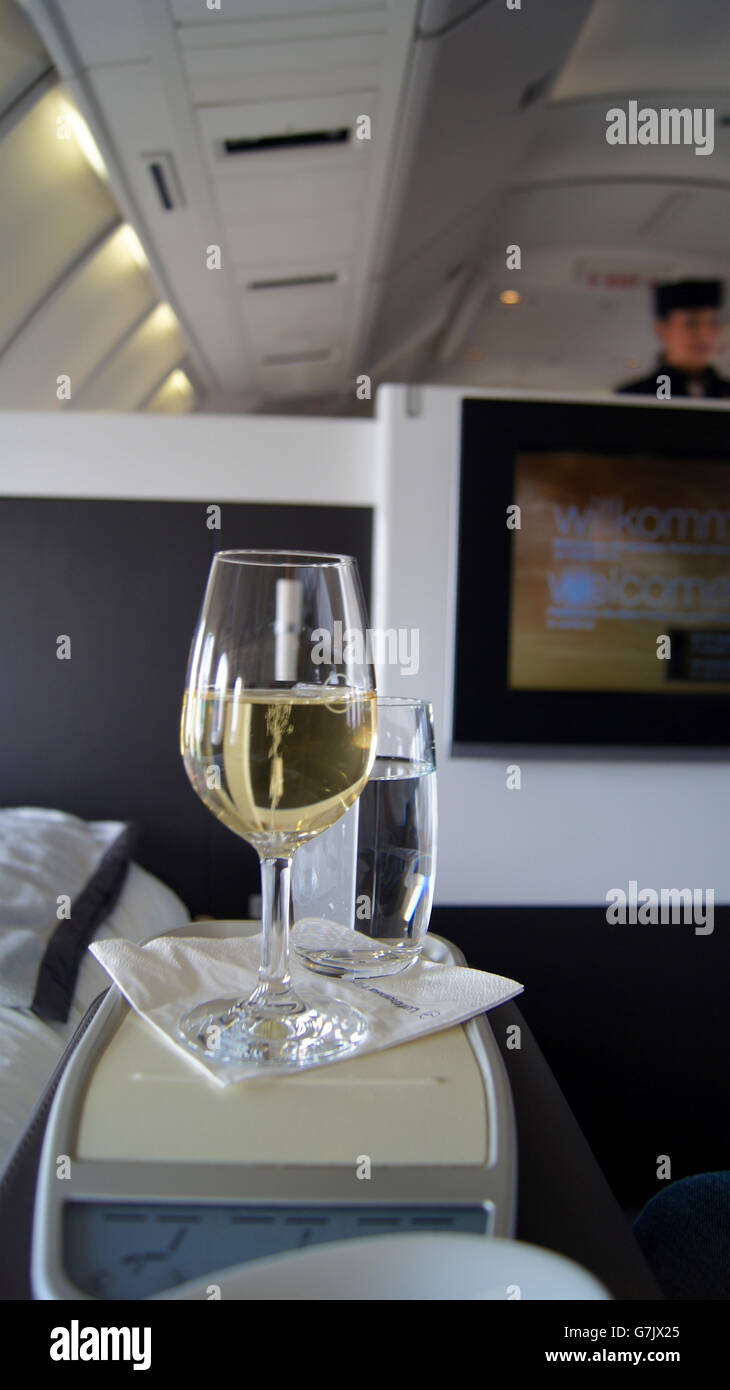 SEPTEMBER 2014: First Class Dining onboard an Boeing 747, white wine ...