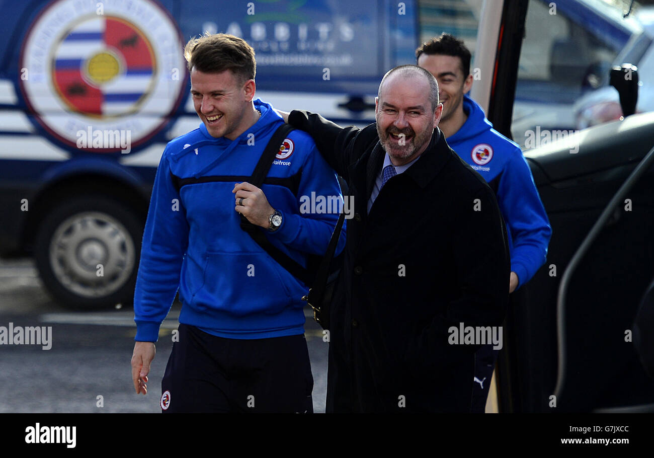 Reading manager Steve Clarke shares a joke with Simon Cox as they make ...