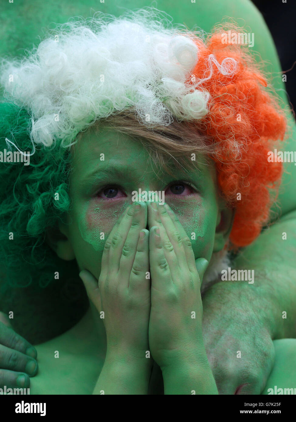 A young fan shows his emotion as he watches the Euro 2016 match between ...