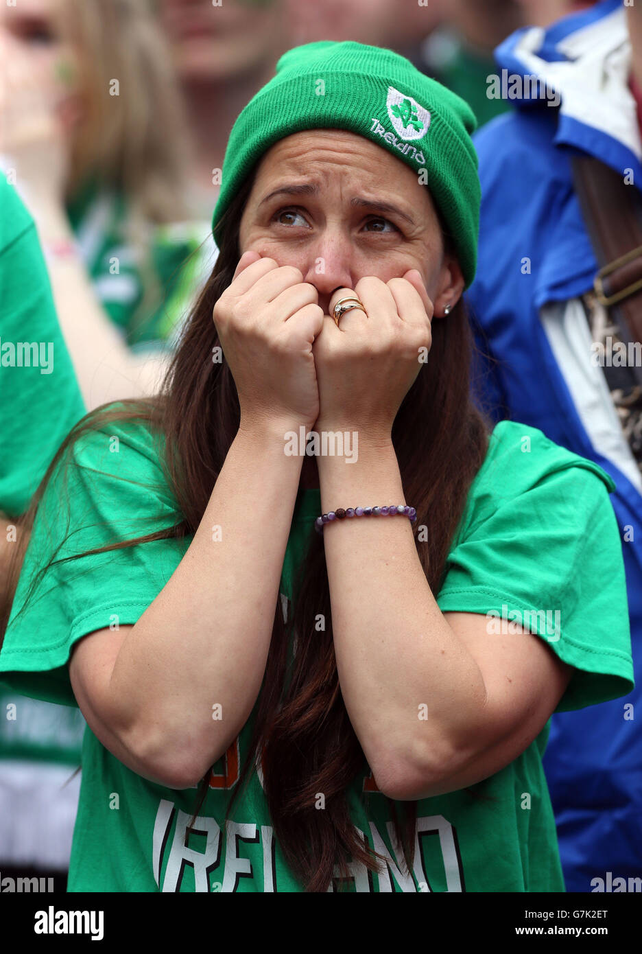 A fan shows her anguish as she watches the Euro 2016 match between ...