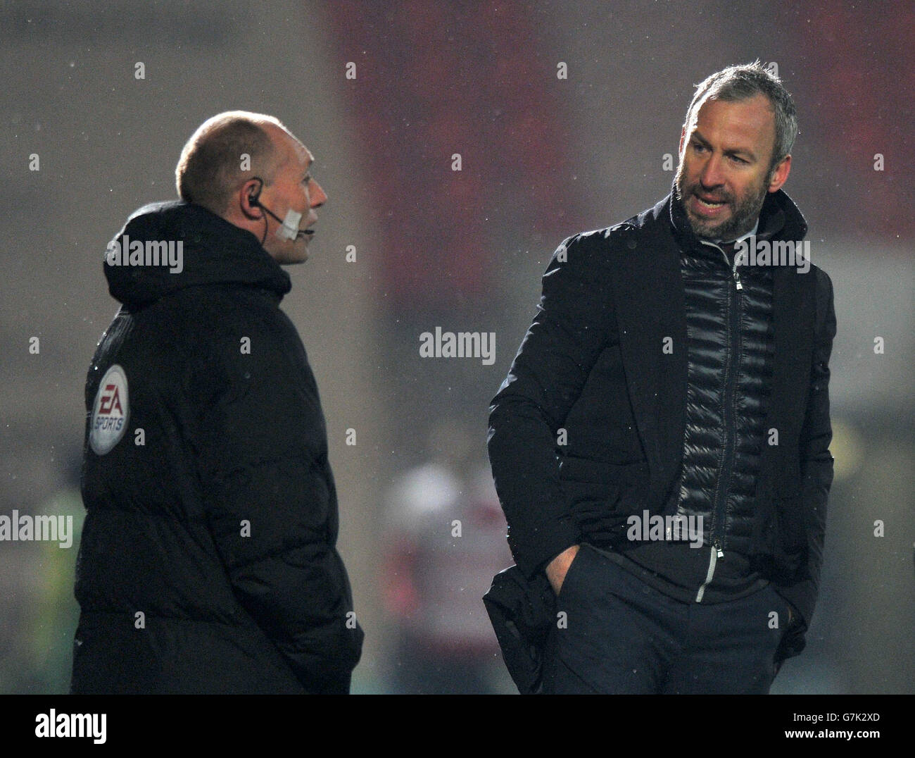 Notts County manager Sean Derry speaks with the fourth official before ...