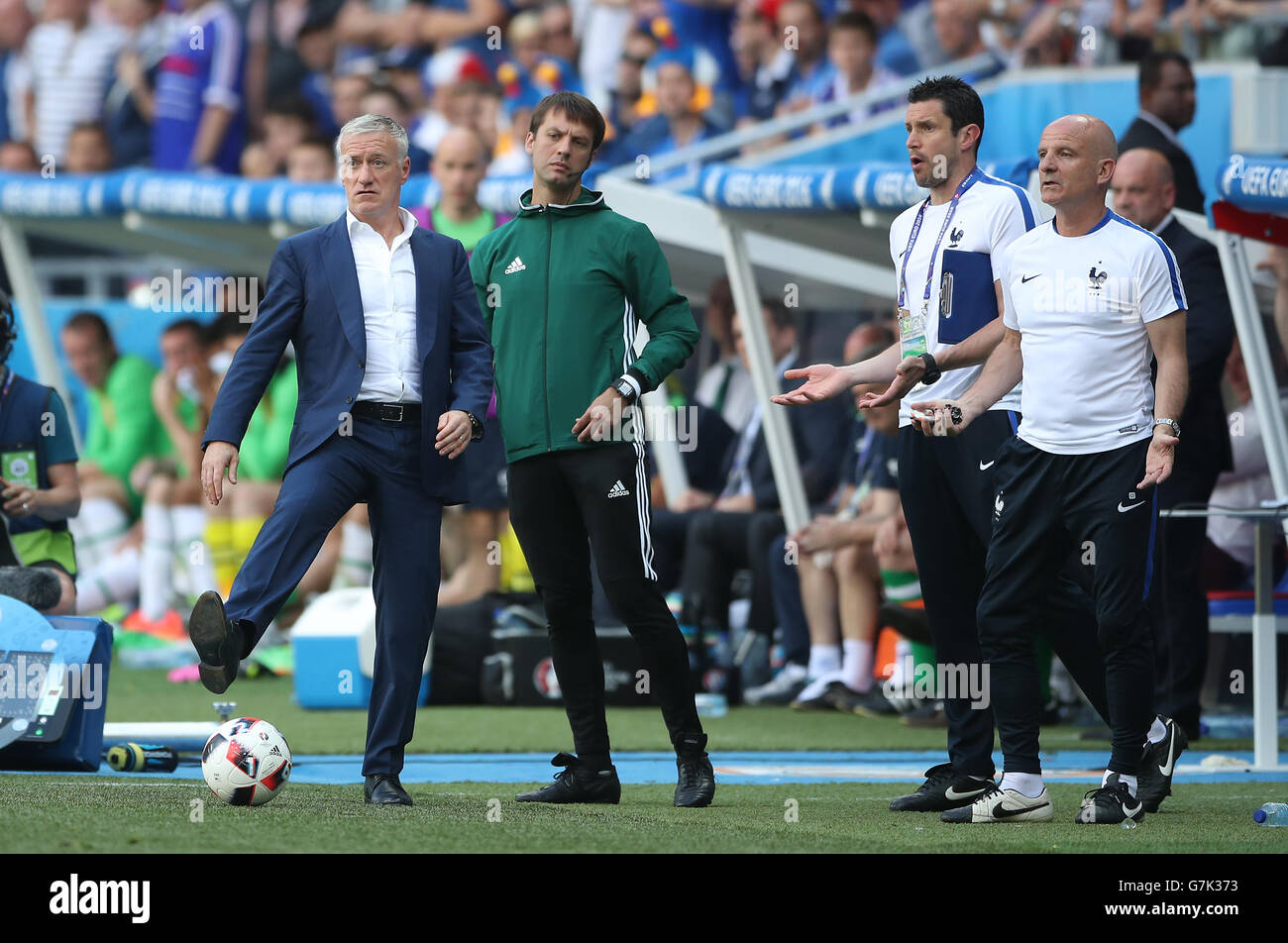 France manager Didier Deschamps (left) and his staff eagerly await the ...