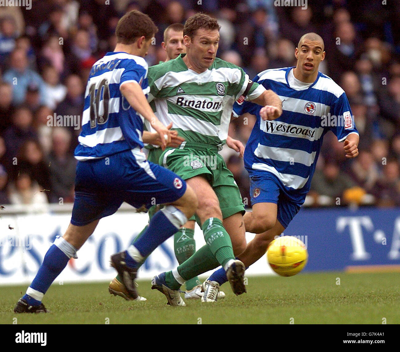 Reading's Nicky Forster (left) and James Harper (right) attempt to ...