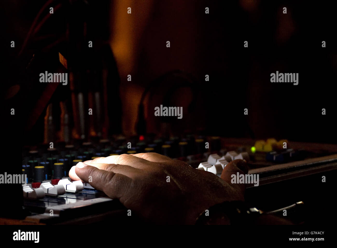 Hands and electronic sound mixer on stage Stock Photo - Alamy