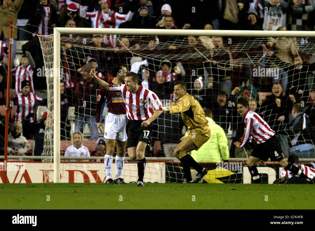 Sunderland's Neil Collins (no 17) celebrates his teammates Liam ...
