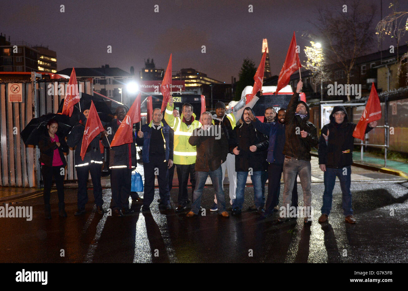 London Bus workers hold a strike outside Waterloo Bus Garage in London ...