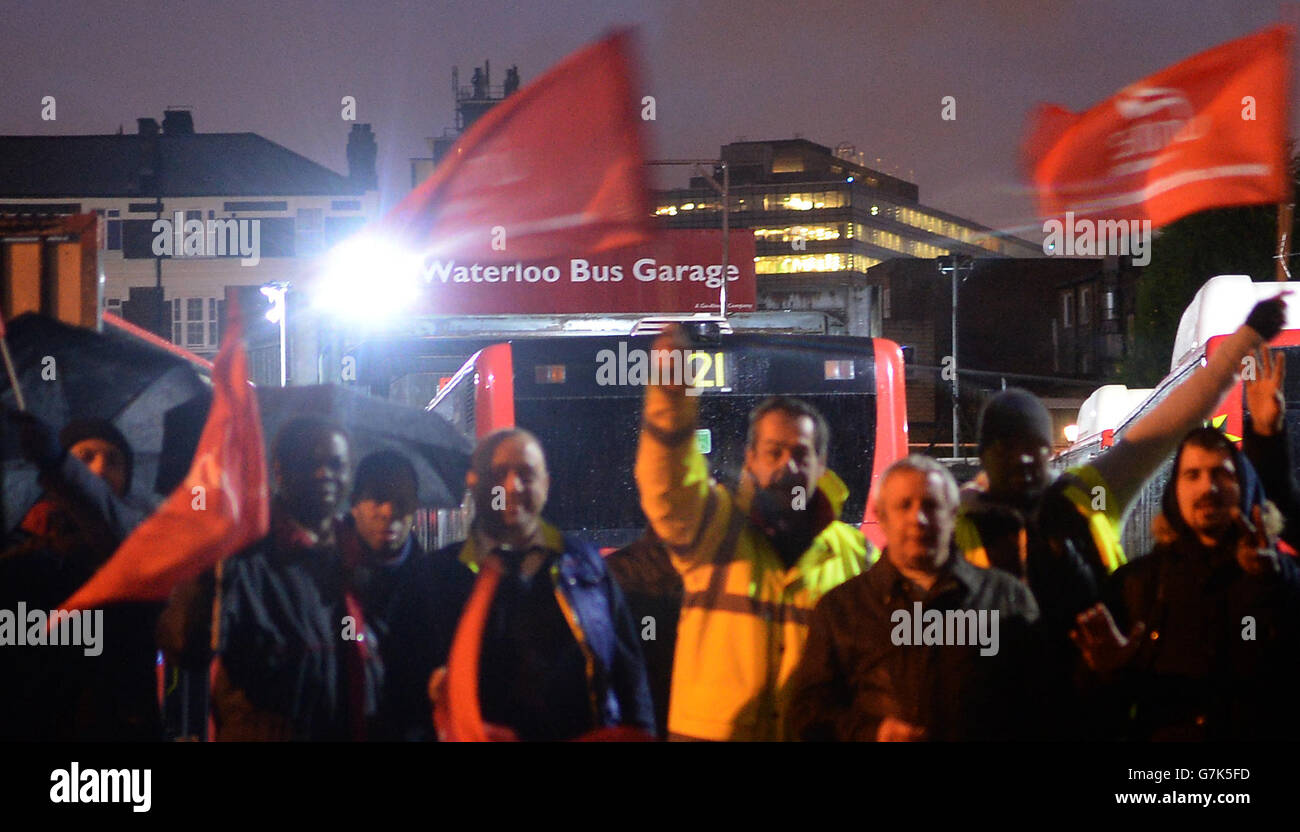 London Bus workers hold a strike outside Waterloo Bus Garage in London ...